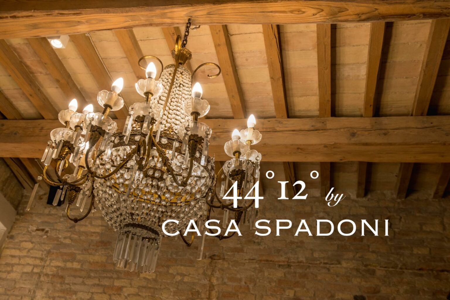 Casa Spadoni davanti alla Basilica di San Vitale diventa 44°12° by Casa ...